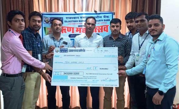 दुर्घटना बीमा योजना: ट्रक ड्राइवर के परिजनों को RMGB बैंक ने दिए 10 लाख ...